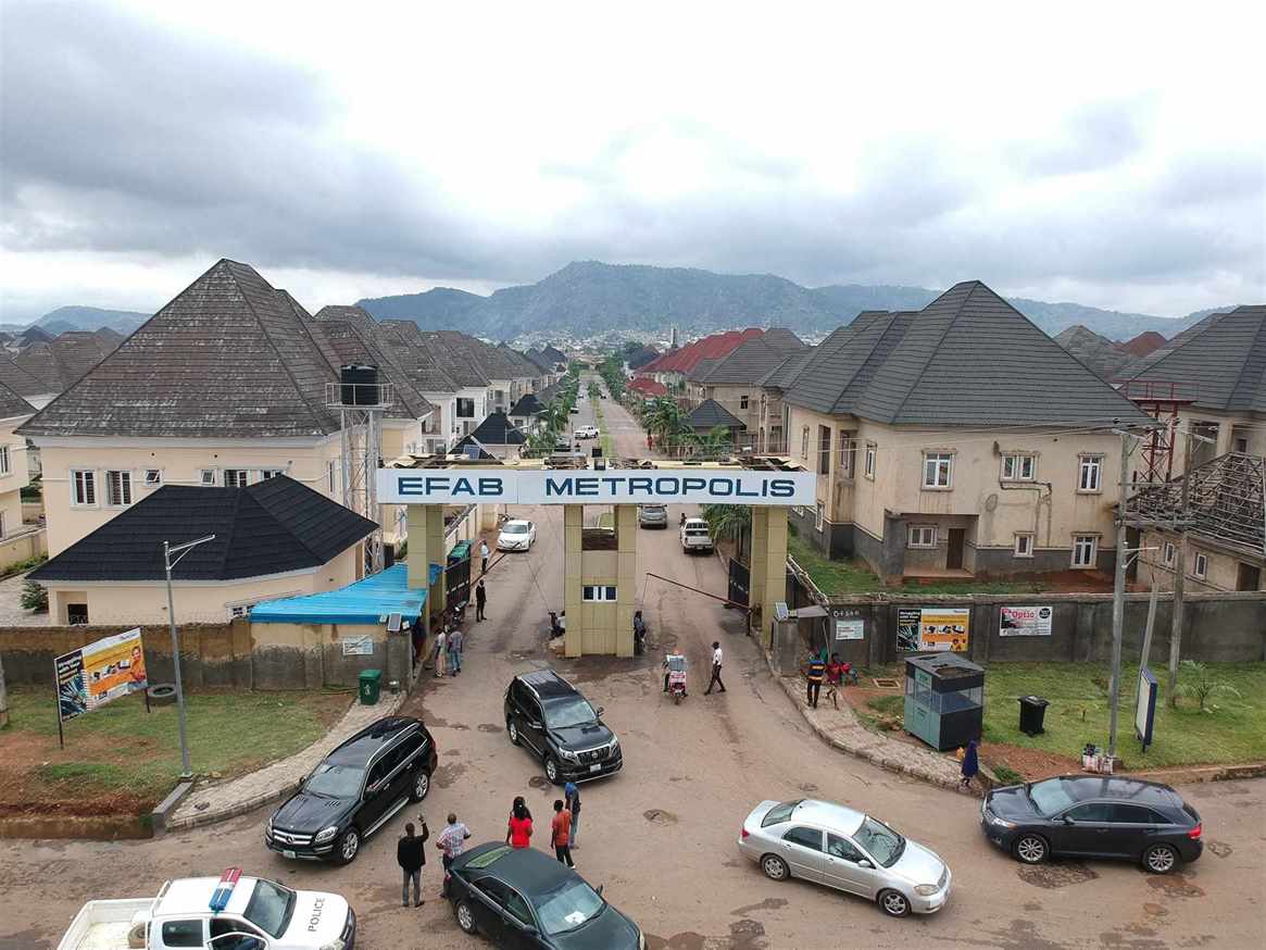 Tension in Abuja as AMAC Shuts Down Efab Metropolis Estate Over ₦600m ...